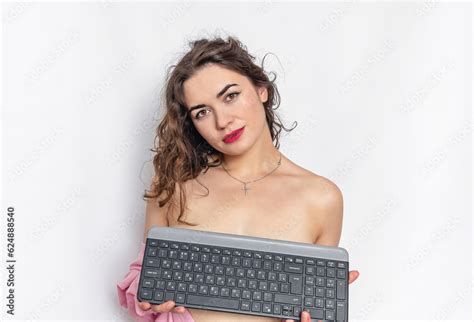 Mysterious Naked Woman With A Keyboard The Head Is Tilted To The Side Bright Makeup Stock