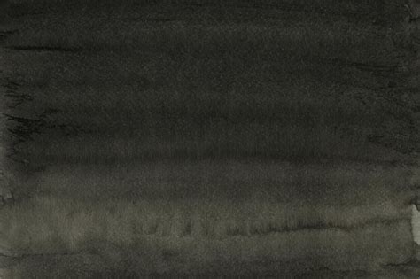 수채화 용지 배경에 그려진 검정 잉크 질감 프리미엄 사진