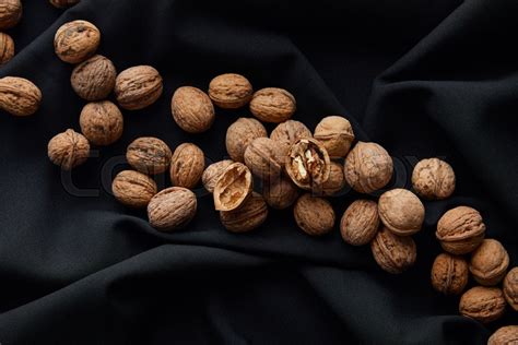 Top View Of Brown Nuts On Black Cloth Stock Image Colourbox