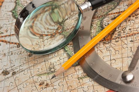 Premium Photo Old Map And A Loop With A Protractor Still Life