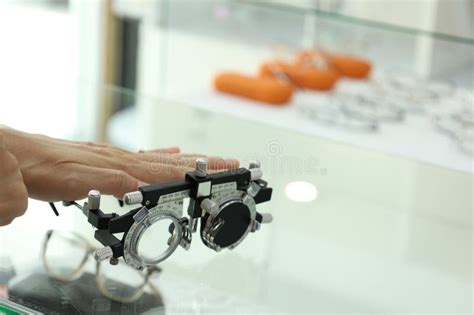 Hand Holding Glasses In Eyeglasses Shop Glasses In Female Hand Stock