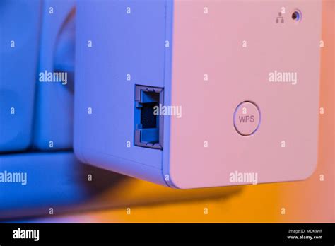 Wifi Repeater In Electrical Socket On The Wall Device That Help To Extend Wireless Network In