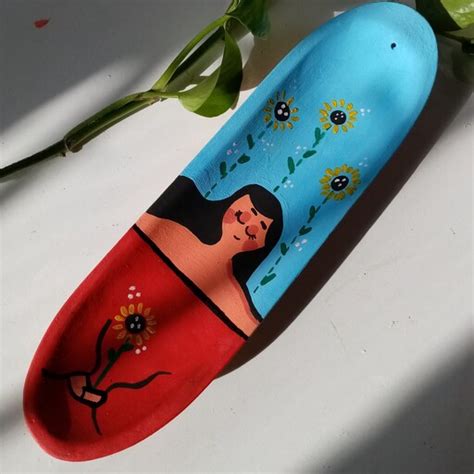 خرید و قیمت جاعودی سفالی طرح دختر از غرفه دیوارکوب سفالی بابونه گالری