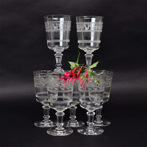 7 Engraved Crystal Wine Glasses In Antique Engraved Glass
