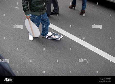 Pro Assad Demonstration In Berlin An Assad Loyalist Stamps On A