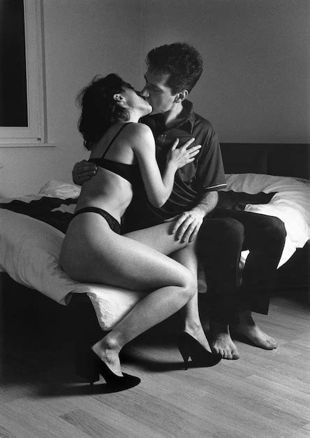 Premium Photo Couple Kissing On Bed At Home