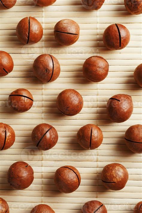 Flat Composition With Australian Macadamia Nuts On Bamboo Light