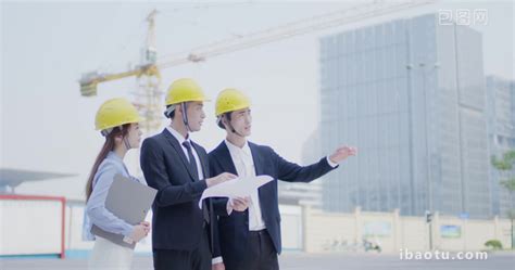 Real Shots Of Drawings Exchange Plans Between Male And Female Designers On Business Construction