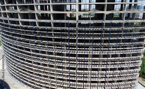 Skeleton Of A Monolithic Multi Storey Building With Scaffolding On The Facade Great