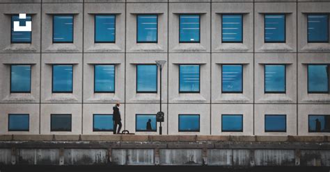 Foto Fotografía Arquitectónica De Edificios Grises Y Azules Imagen Copenhague Gratis En Unsplash