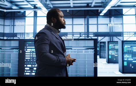 Admin Inspecting Server Farm Equipment Walking Between Supercomputers It Specialist Doing