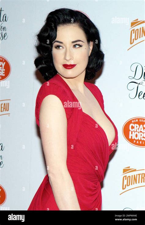 Queen Of Burlesque Dita Von Teese Looks Stunning In A Flowing Red Gown