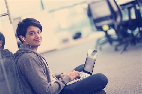 Premium Photo Young Indian Software Developer Man Using Laptop Computer Writing Programming