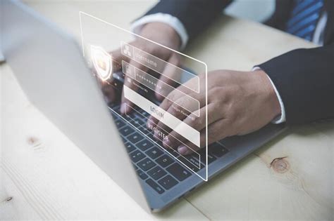 premium photo businessman input password login uses a laptop computer