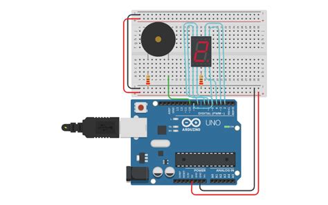 circuit design display 7 segmentos contagem mais buzzer tinkercad