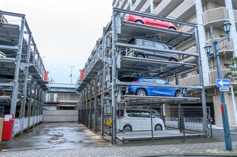 Japans Automated Parking Robots Stack Cars Like Vending Machines