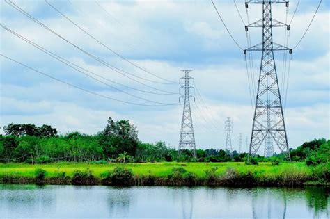 Premium Photo Highvoltage Transmission Towers Complex Steel Structures In Rural Areas Of Thailand