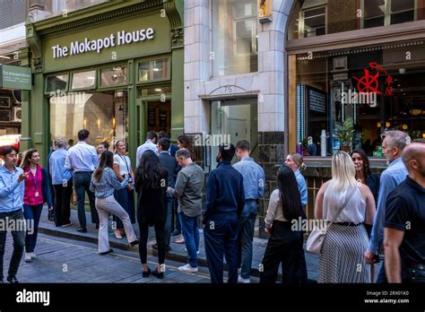 City Of London Workers Queue For A Takeaway Lunch At The Mokapot House Cafe In The City Of