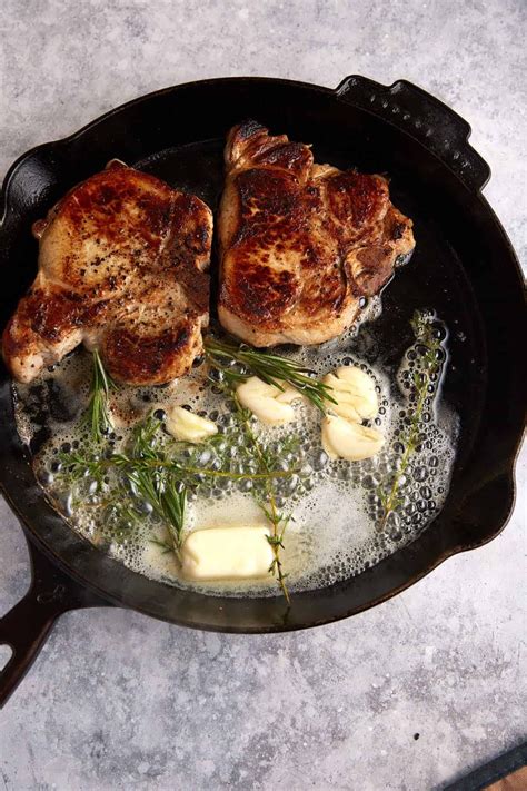 Garlic Butter Pork Chops In A Cast Iron Skillet Butter And Baggage