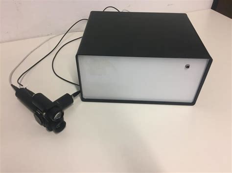 Photograph Of The System With Integrated Metrology Head Light Source