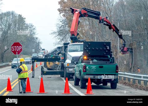 Tree Crew Works On Side Of A Busy Highway Stock Photo Alamy