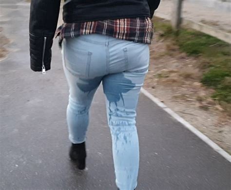 Public Wetting And Rewetting Tight Blue Jeans And Leather Jacket