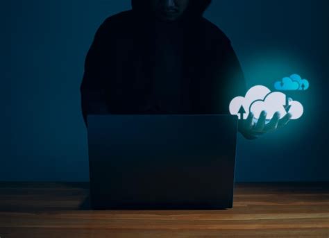 premium photo hackers work on laptops in the dark concepts of information security systems in
