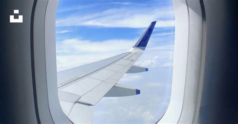 흰색과 파란색 비행기 날개 사진 Unsplash의 무료 파랑 이미지