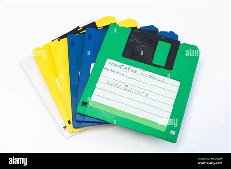 Floppy Disk Stack One With A Copy Of Microsoft Windows 31 Hand