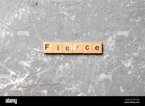 Fierce Word Written On Wood Block Fierce Text On Cement Table For Your