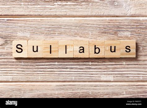 syllabus word written on wood block syllabus text on table concept