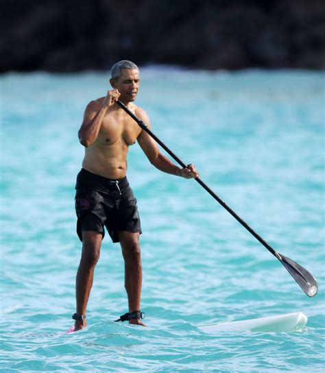 Barack Obama Takes Shirtless Paddle Board Ride In Hawaii