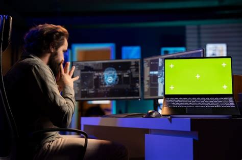 Free Photo Green Screen Laptop Next To Programmer In Home Office Staggered By Sentient Ai