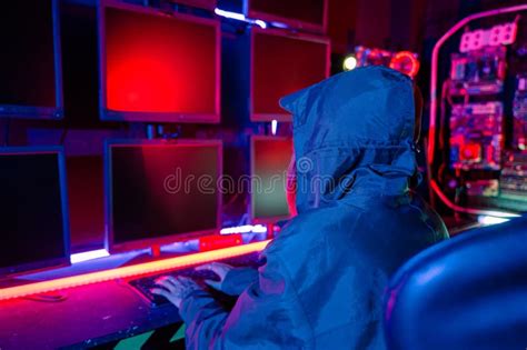 Woman Hacker Wear Hood Sit Front Computer Typing On Keyboard Hacking