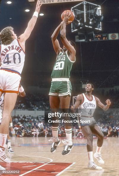 Darren Daye Of The Boston Celtics Shoots Over Kurt Nimphius Of The