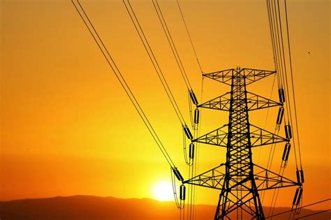 Premium Photo Silhouette Of High Voltage Poles With Electric Wires Silhouette Of High Voltage