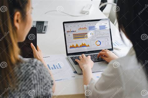 Two Data Analysts Working On Data Analysis Dashboard For Business Strategy Stock Image Image