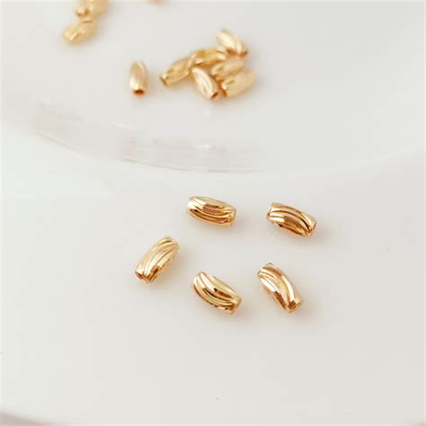 保色配件14k包金斜纹批花小米珠直孔直管串珠隔珠散珠手工diy配饰虎窝淘
