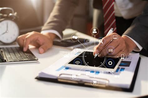 Business Man Using Digital Tablet Analyzes Business Data Busy Working