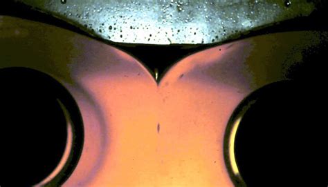 Free Surface Cusp On Golden Syrup Formed By Counter Rotation Of Two Download Scientific Diagram