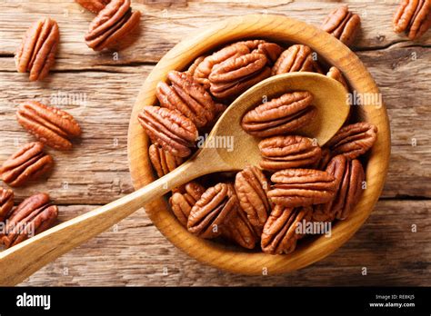 Raw Pecan Nuts In A Bowl Close Up On The Table Horizontal Top View