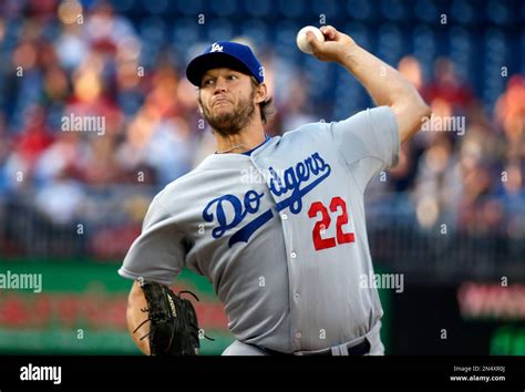 Los Angeles Dodgers Starting Pitcher Clayton Kershaw Throws During The