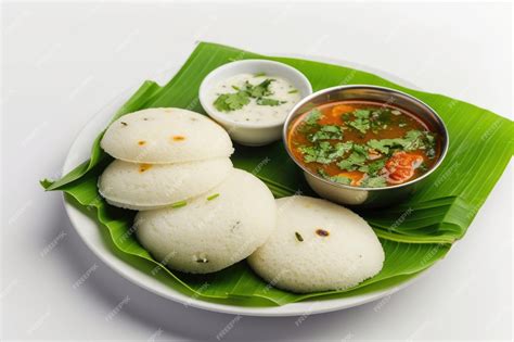 Premium Ai Image Idly Sambar Or Idli With Sambhar And Green Red Chutney Popular South Indian