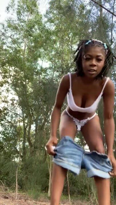 Ebony Pees In The Woods