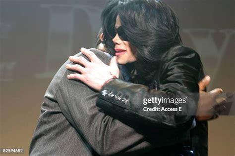 Michael Jackson Fans Holding Photos And Premium High Res Pictures