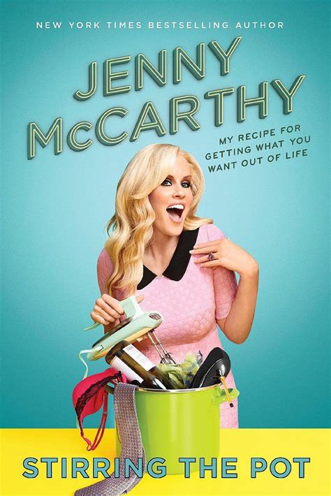 A Woman In Pink Shirt Holding A Green Bucket Filled With Clothes And