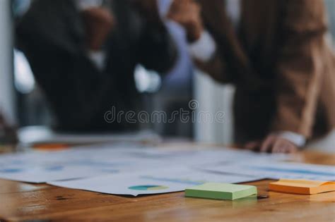 Business Professionals Group Of Young Confident Business People Analyzing Data Using Computer