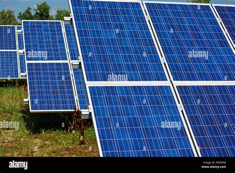 Blue Solar Panels On A Sunny Day Stock Photo Alamy