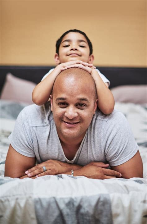 Love Father And Son In Portrait In Bedroom For Bonding With Smile Home And Family For