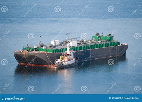 Tugboat Push Large Cargo Vessel To Berth At Port Terminal Port Terminal Operations And Handling